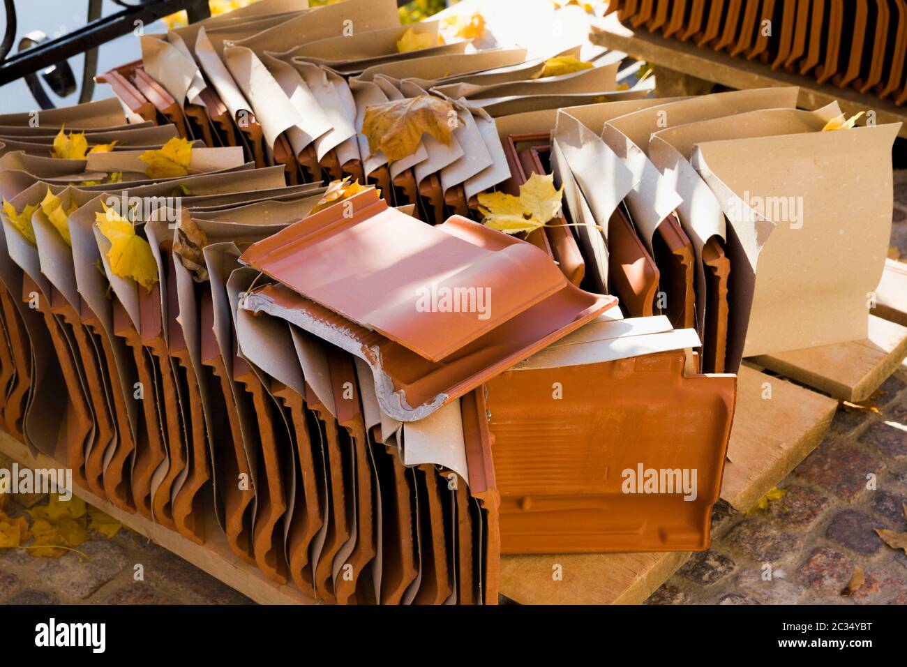 modern real clay tiles Packed in bundles, used during the construction ...