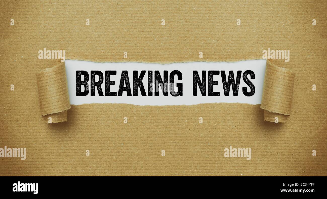 Torn paper revealing the words Breaking news Stock Photo - Alamy