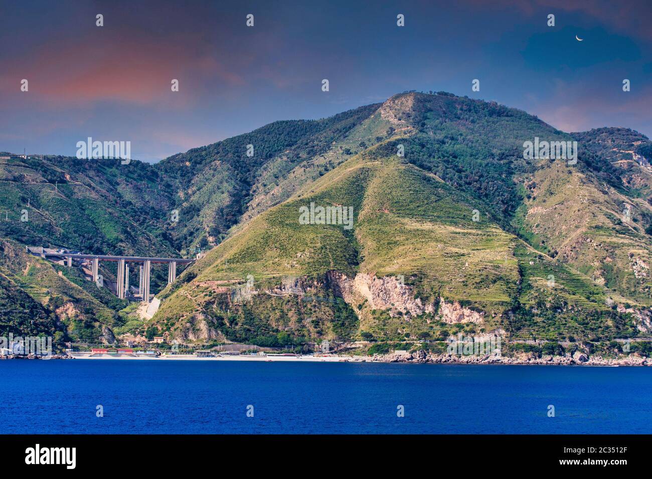 Green Hills and Bridge Over Deep Blue Water in Mediterranean Stock ...