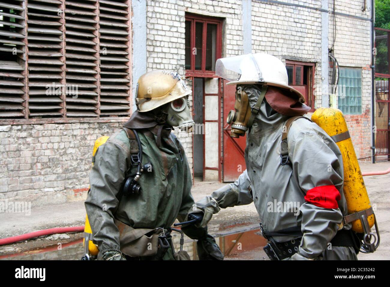 fireman wearing a gas mask on the stairs Stock Photo - Alamy