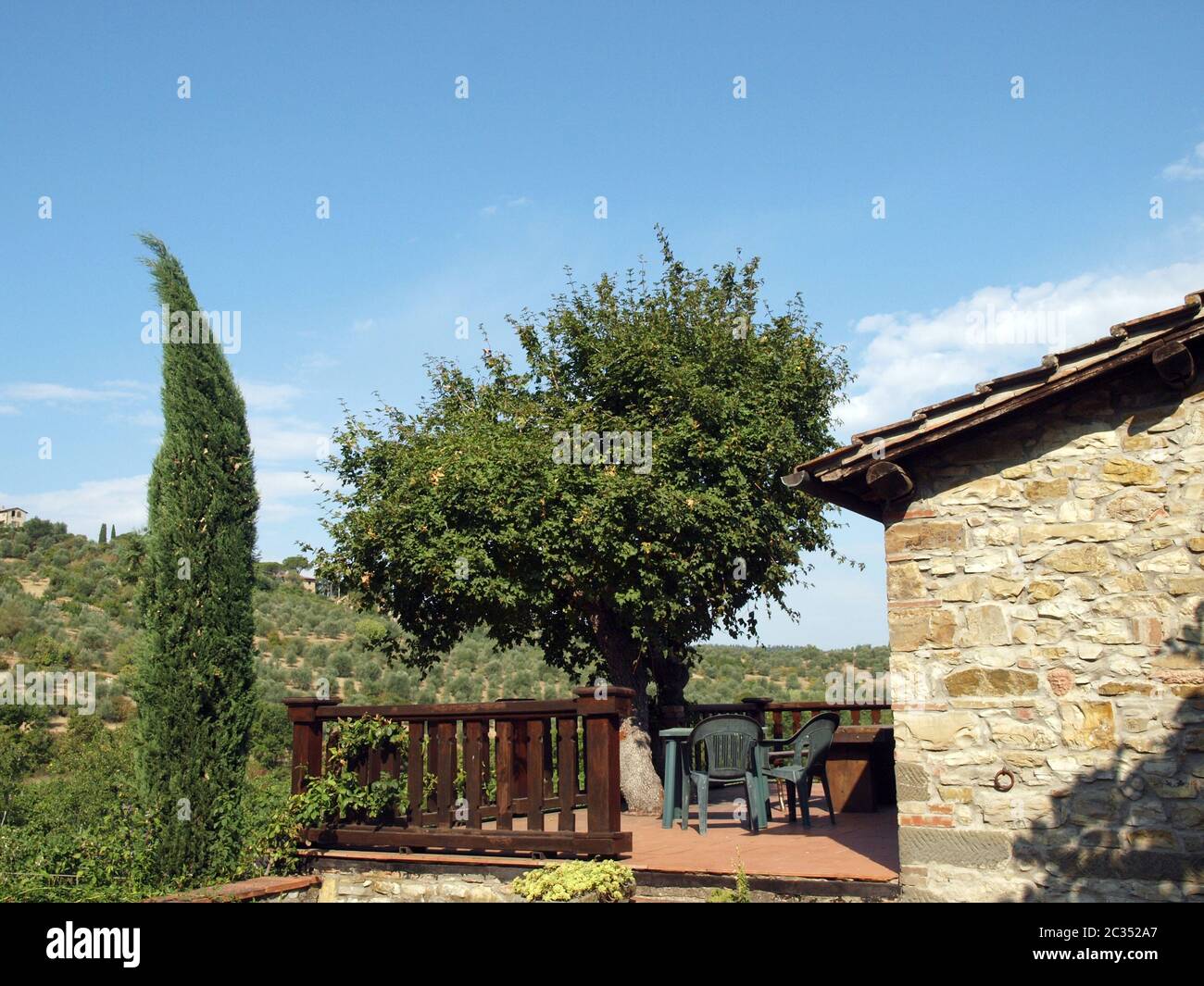 terrace with the view on vineyards in Tuscany Stock Photo - Alamy