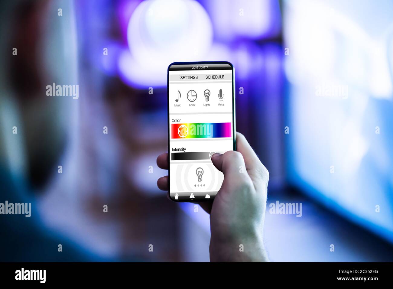 Person Controlling Light With App On Phone Stock Photo - Alamy