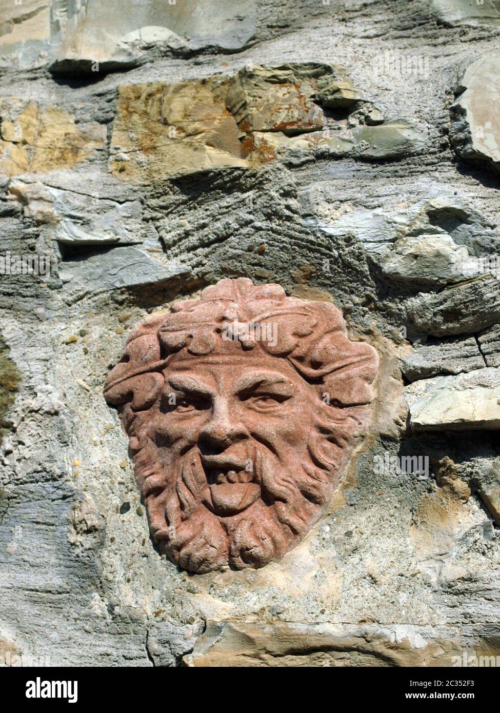 The face deep in the stone Stock Photo - Alamy
