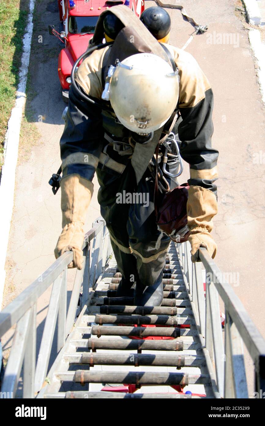 fireman on the stairs Stock Photo - Alamy