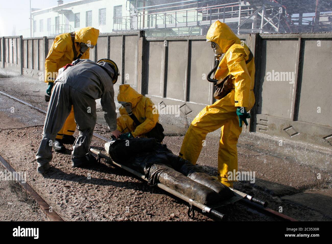 Man in chemical protection suit Stock Photo - Alamy