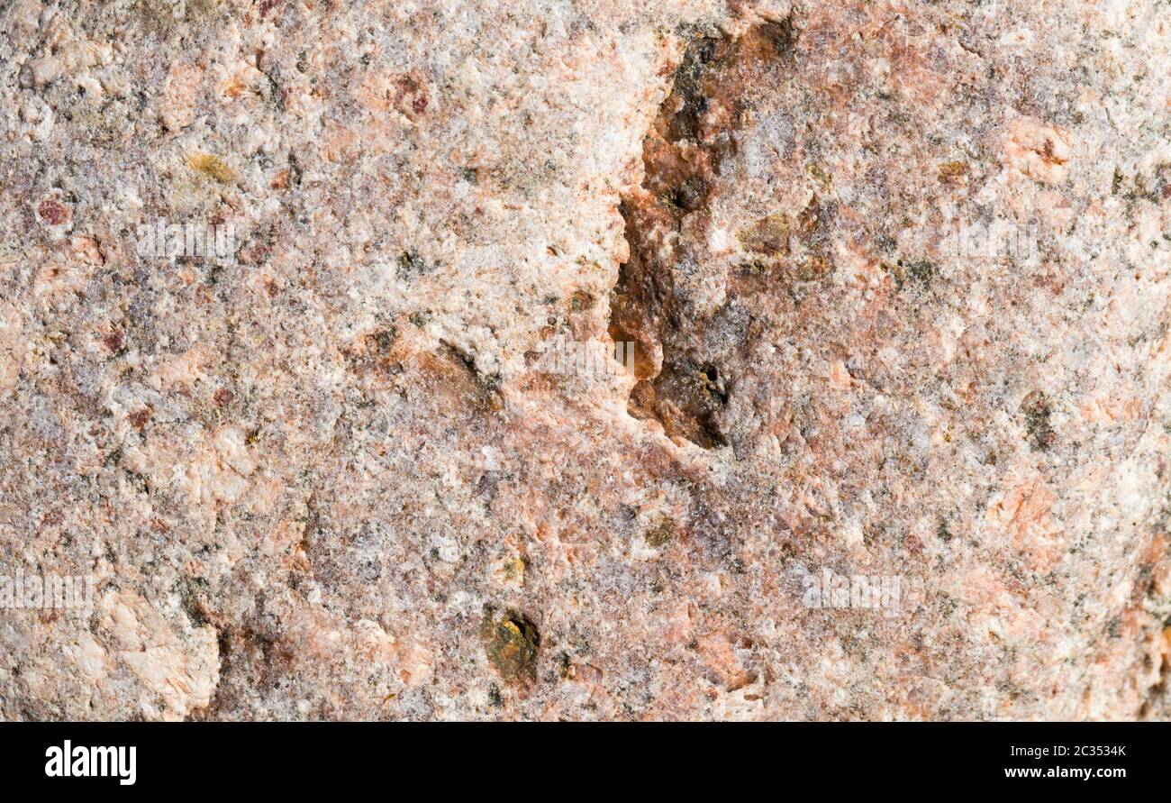 structure of large real stone having uneven rough structure, close-up ...