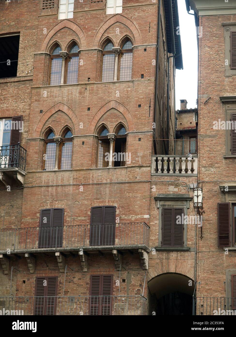Siena - brick facades of Gothic buildings at Piazza Del Campo Stock ...