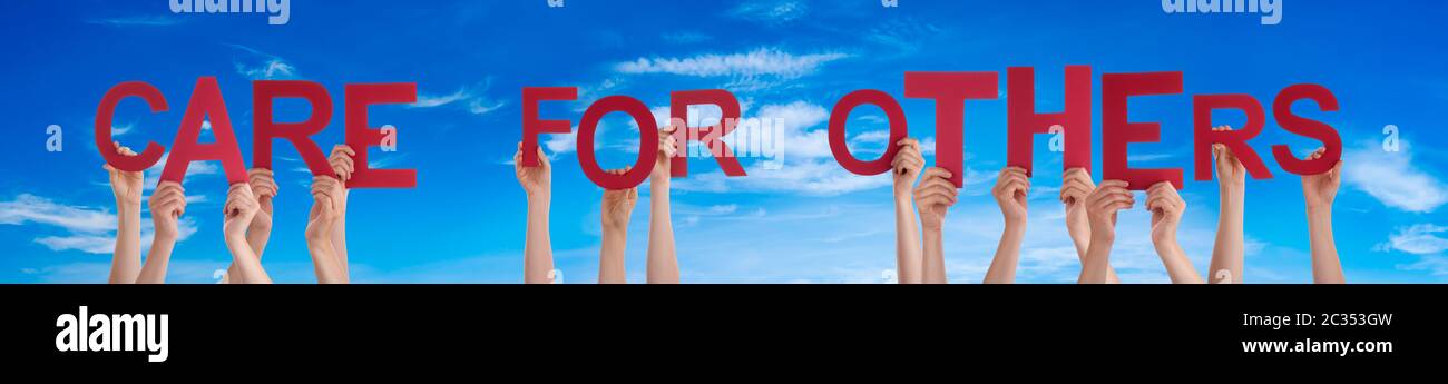 People Hands Holding Colorful English Word Care For Others. Blue Sky As ...