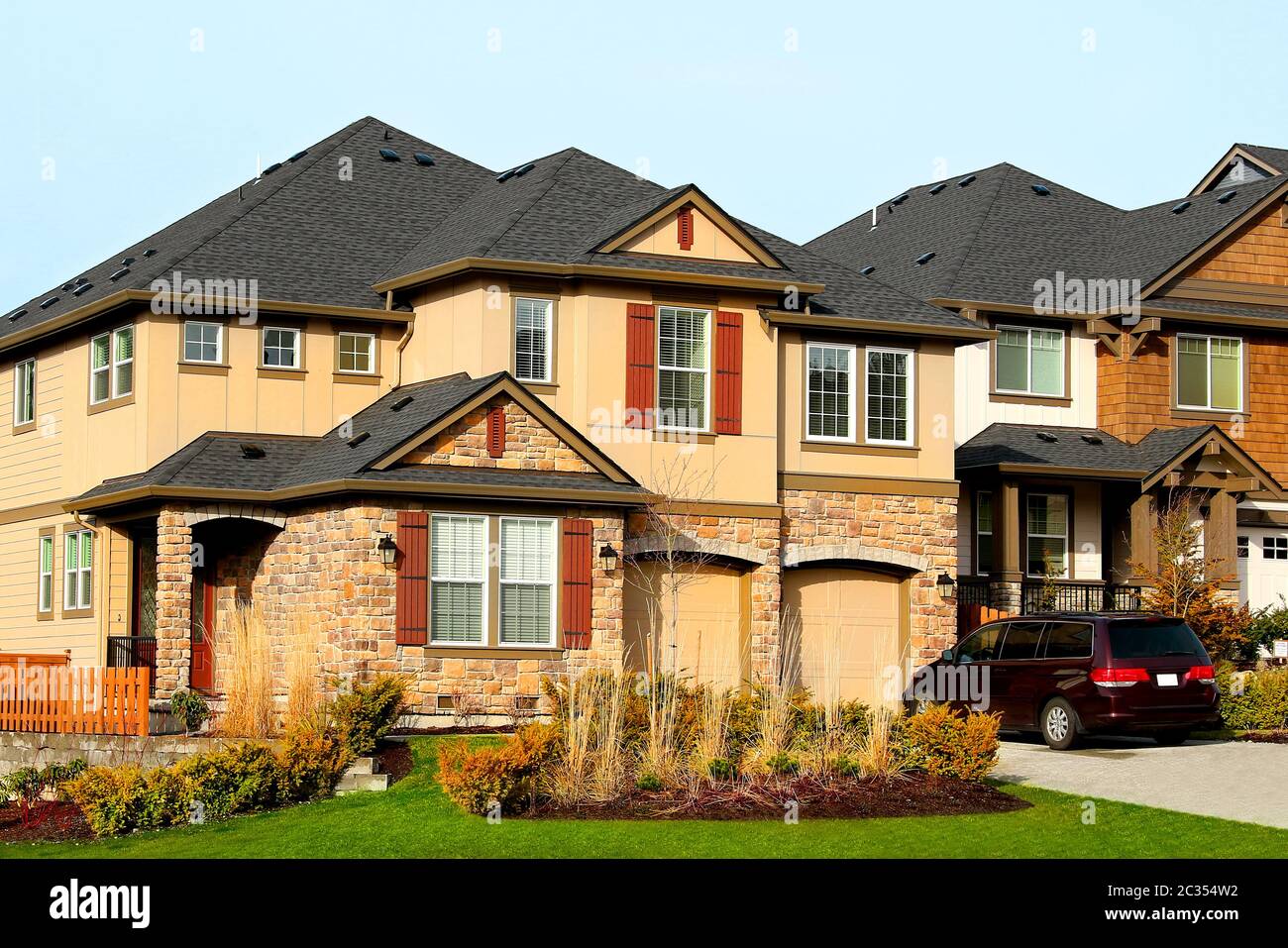 Family home with perfect grass landscaping with artificial grass Stock ...