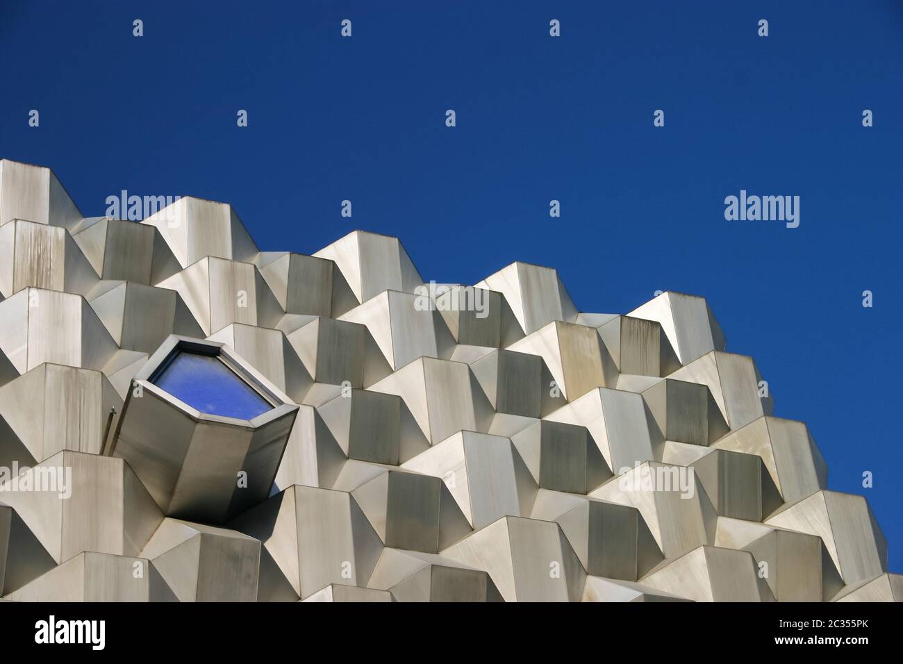 Futuristic Building with small window Stock Photo - Alamy