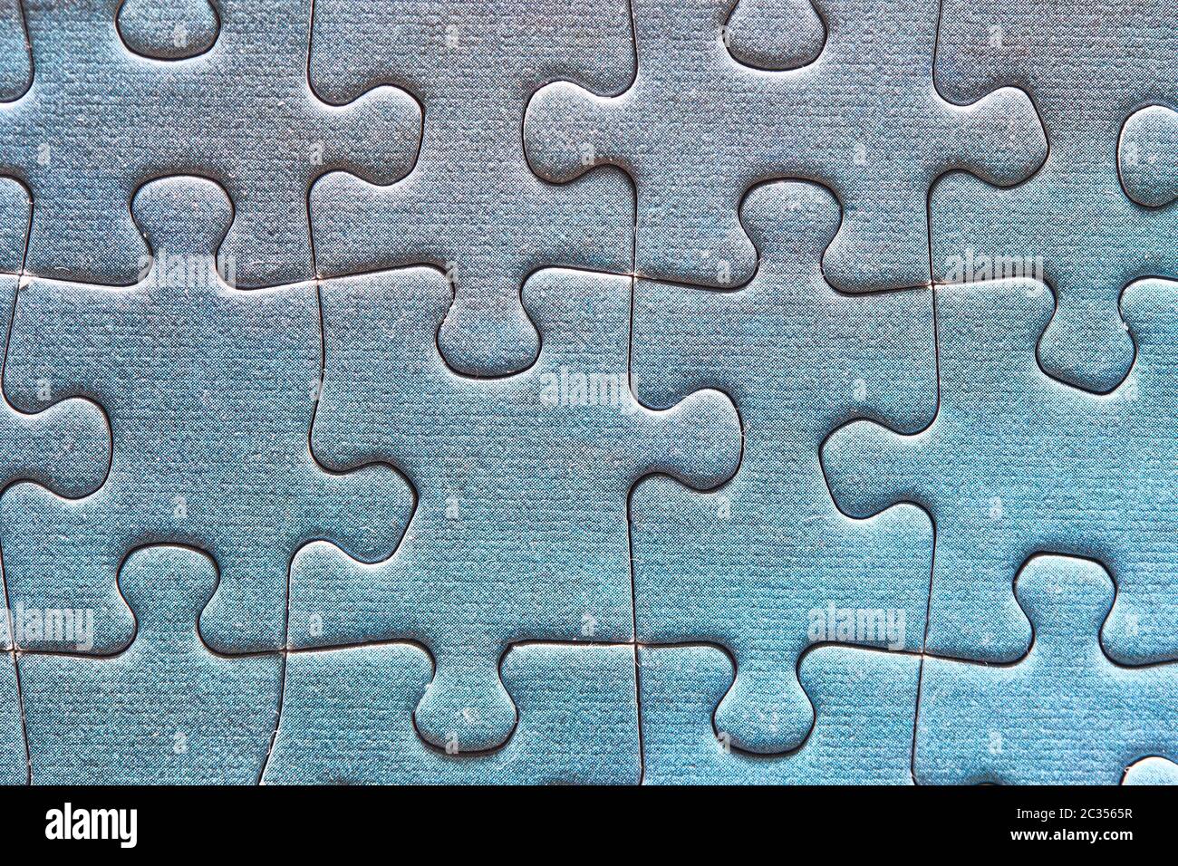 Jigsaw puzzle background, completed pattern Stock Photo - Alamy