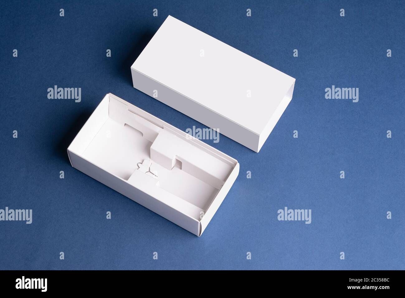 Smartphone's pull out boxes on blue surface, editable mock up template ...