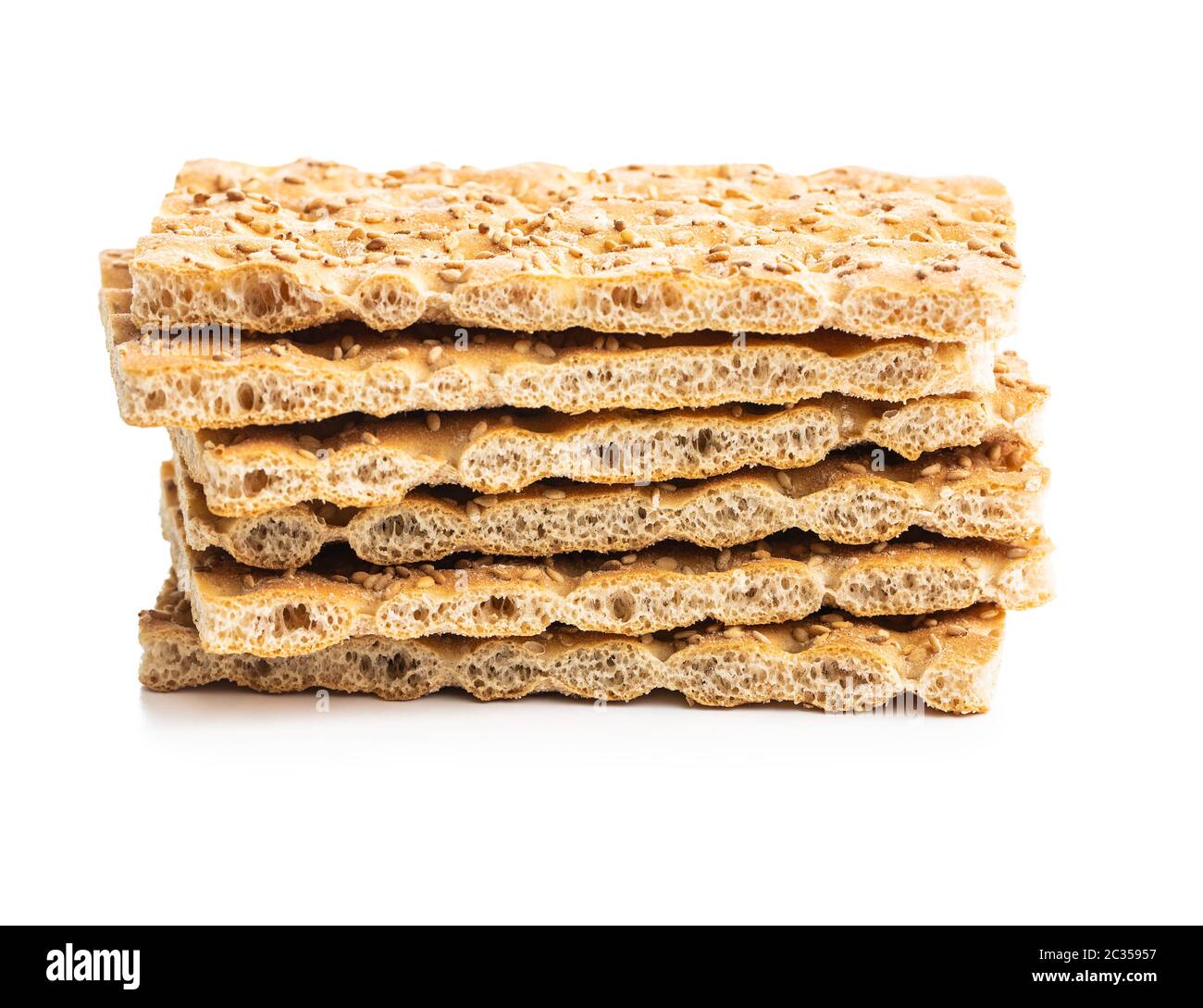 Knackebrot. Wholegrain crispbread with sesame seeds isolated on white ...