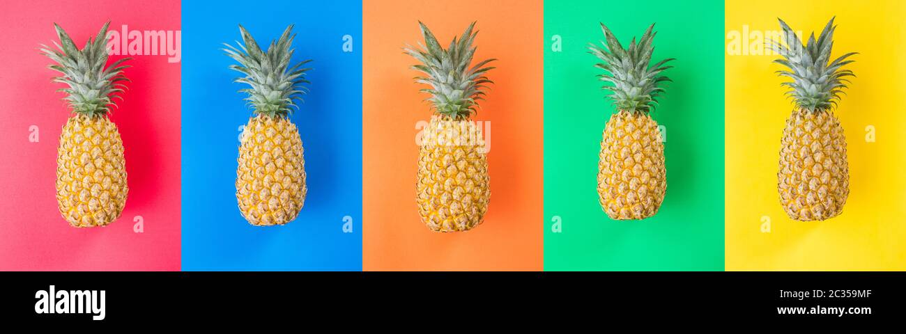 Fresh pineapple on the colorful background Stock Photo - Alamy