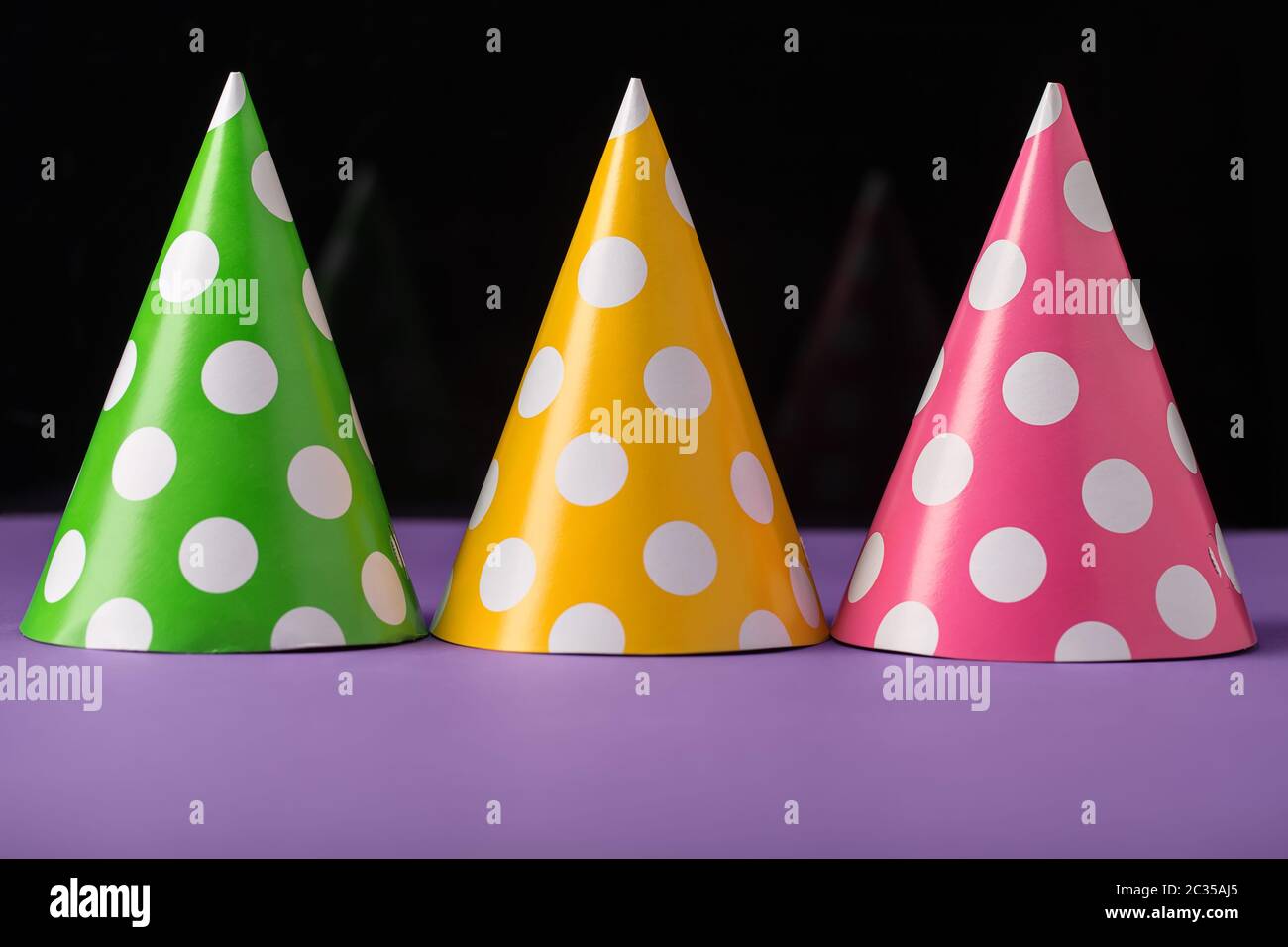 Three party hats Stock Photo - Alamy