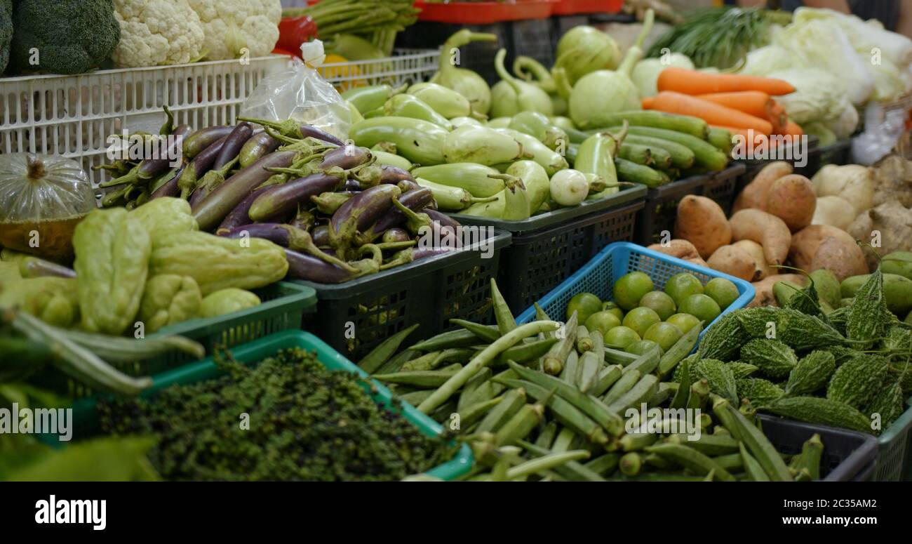 Fresh vegetable sell in wet market Stock Photo - Alamy