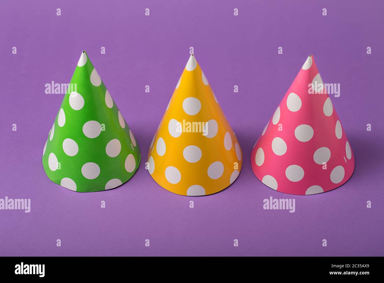 Three party hats Stock Photo - Alamy
