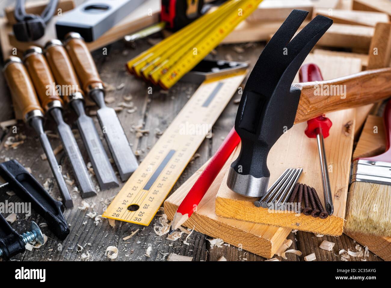 Close-up of carpenter's tools on an antique wooden table. Construction ...