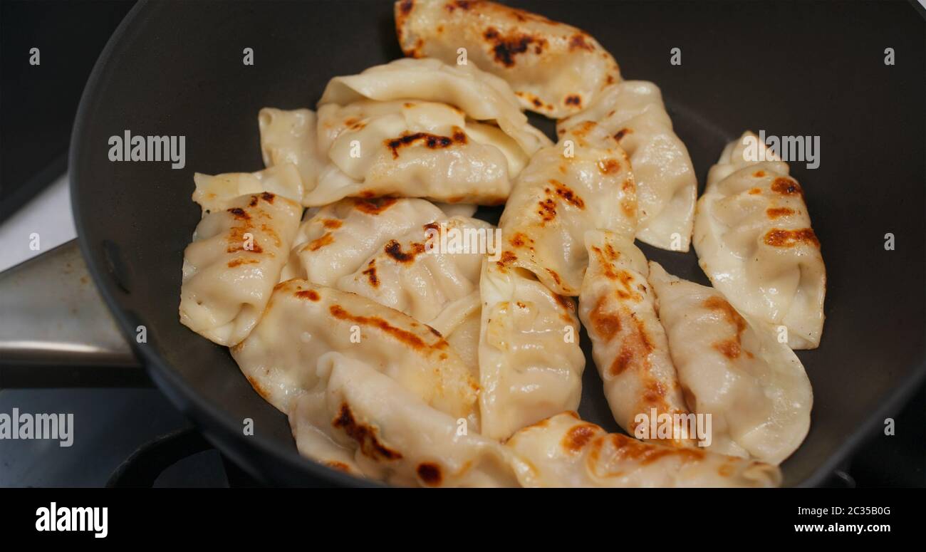 Fry japanese meat dumpling in hi-res stock photography and images - Alamy