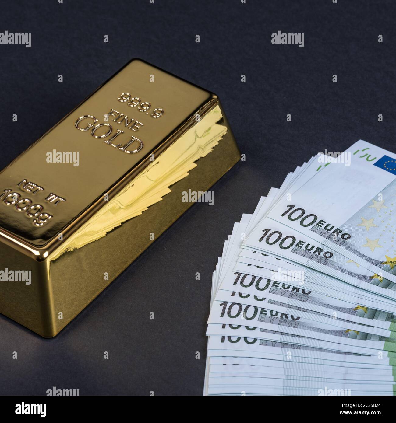Euro cash and gold bar on a black background. Banknotes. Money. Bill ...