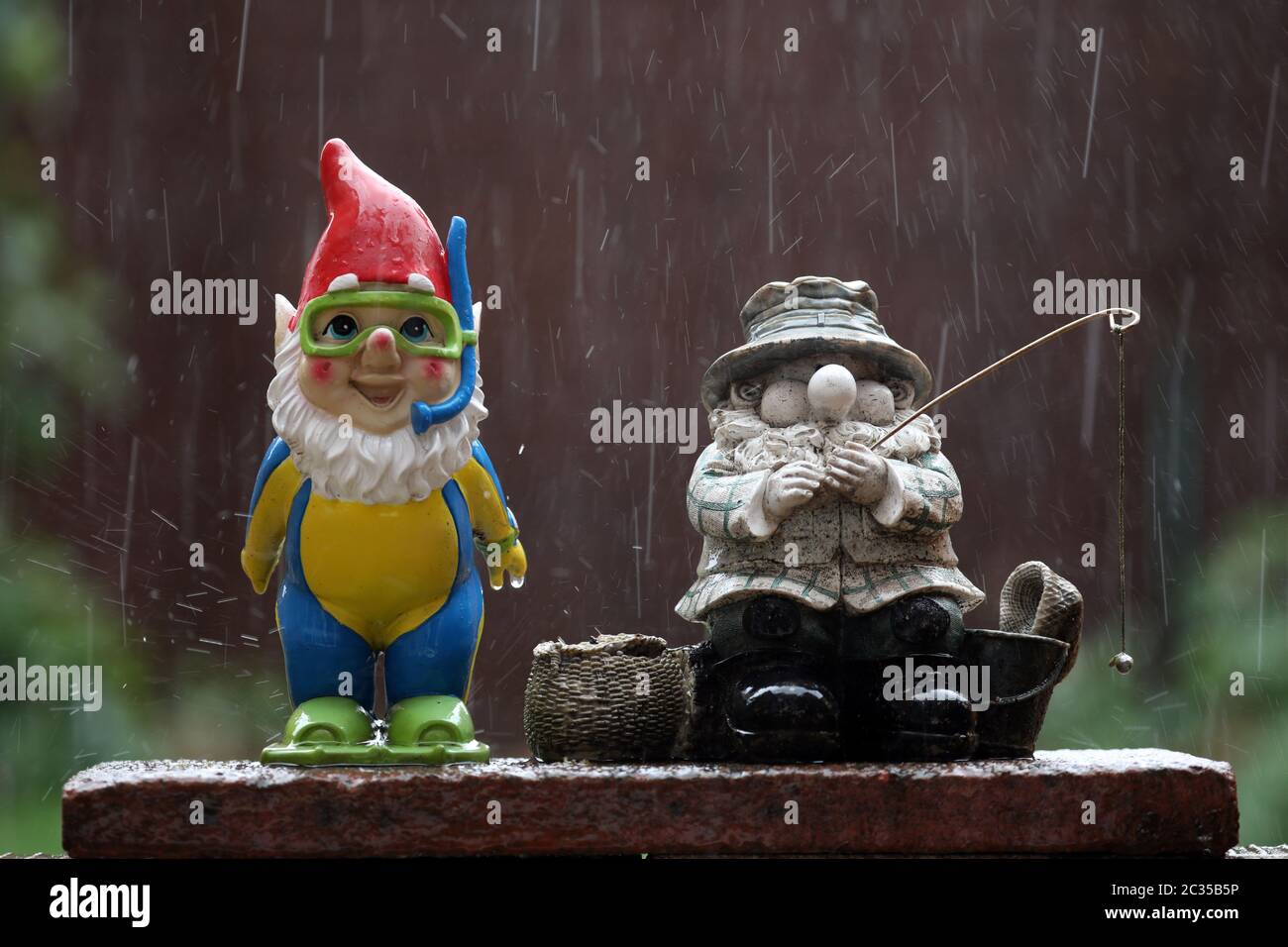 Garden gnomes in rain hi-res stock photography and images - Alamy