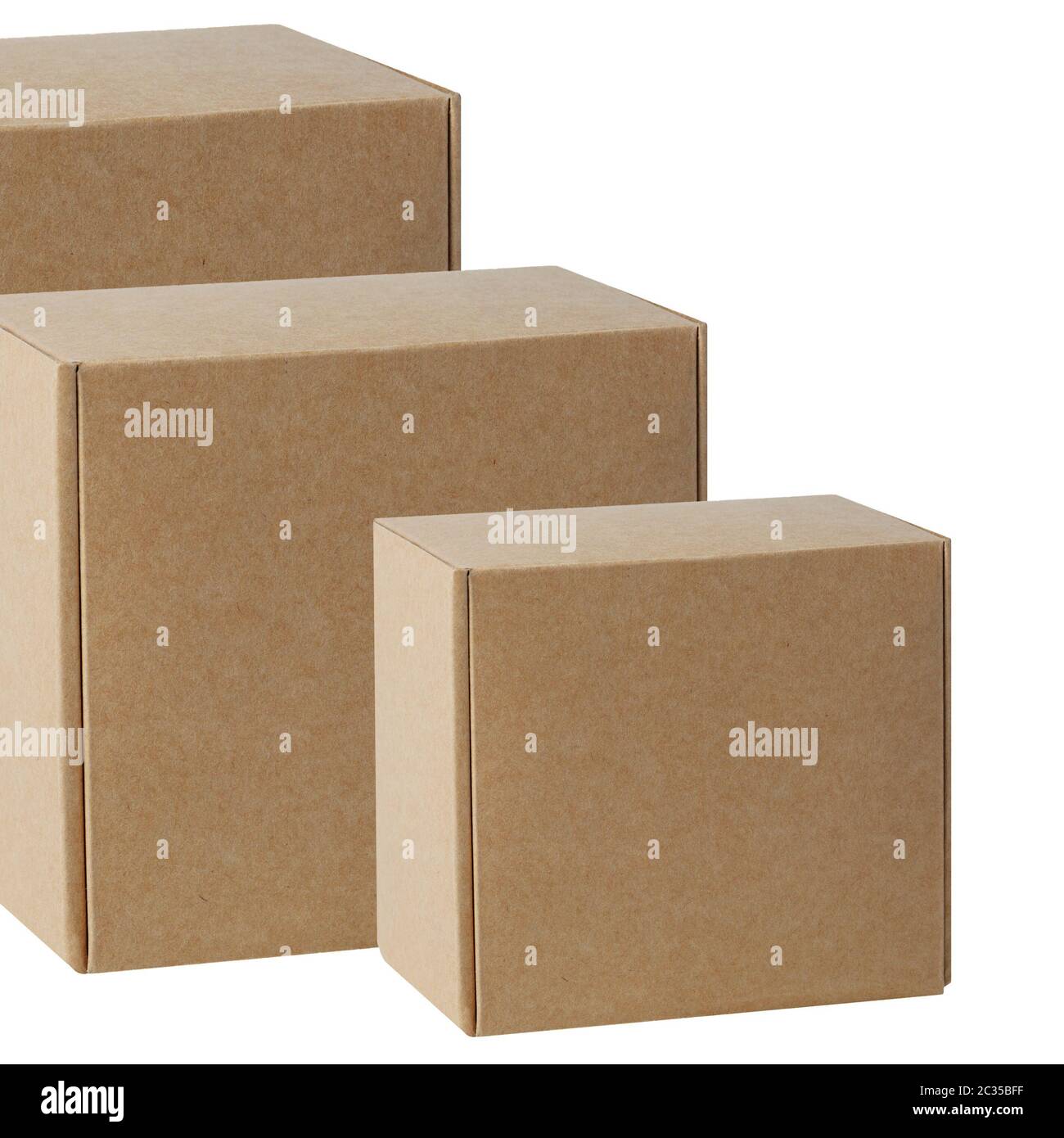 Cardboard boxes of various sizes are arranged in a row diagonally ...