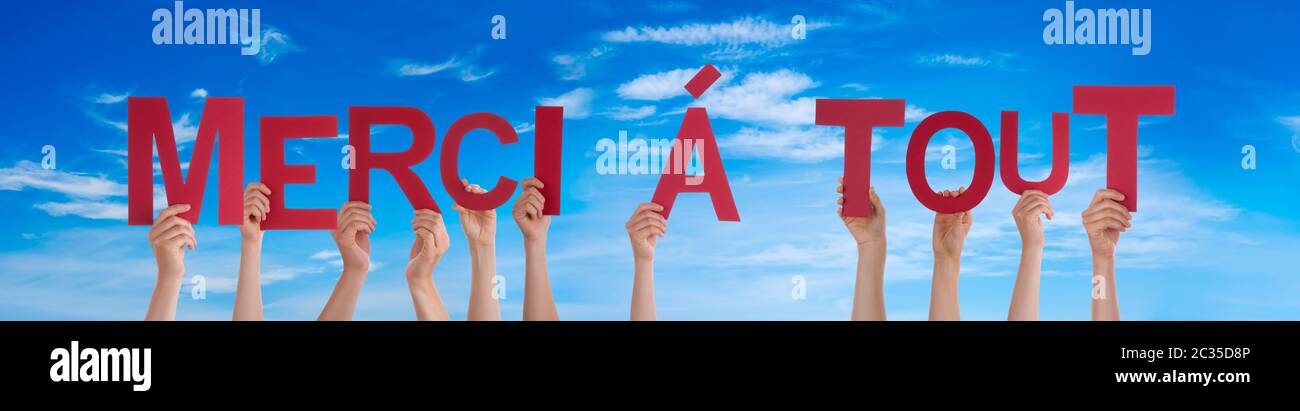 People Hands Holding Colorful French Word Merci A Tout Means Thank You ...