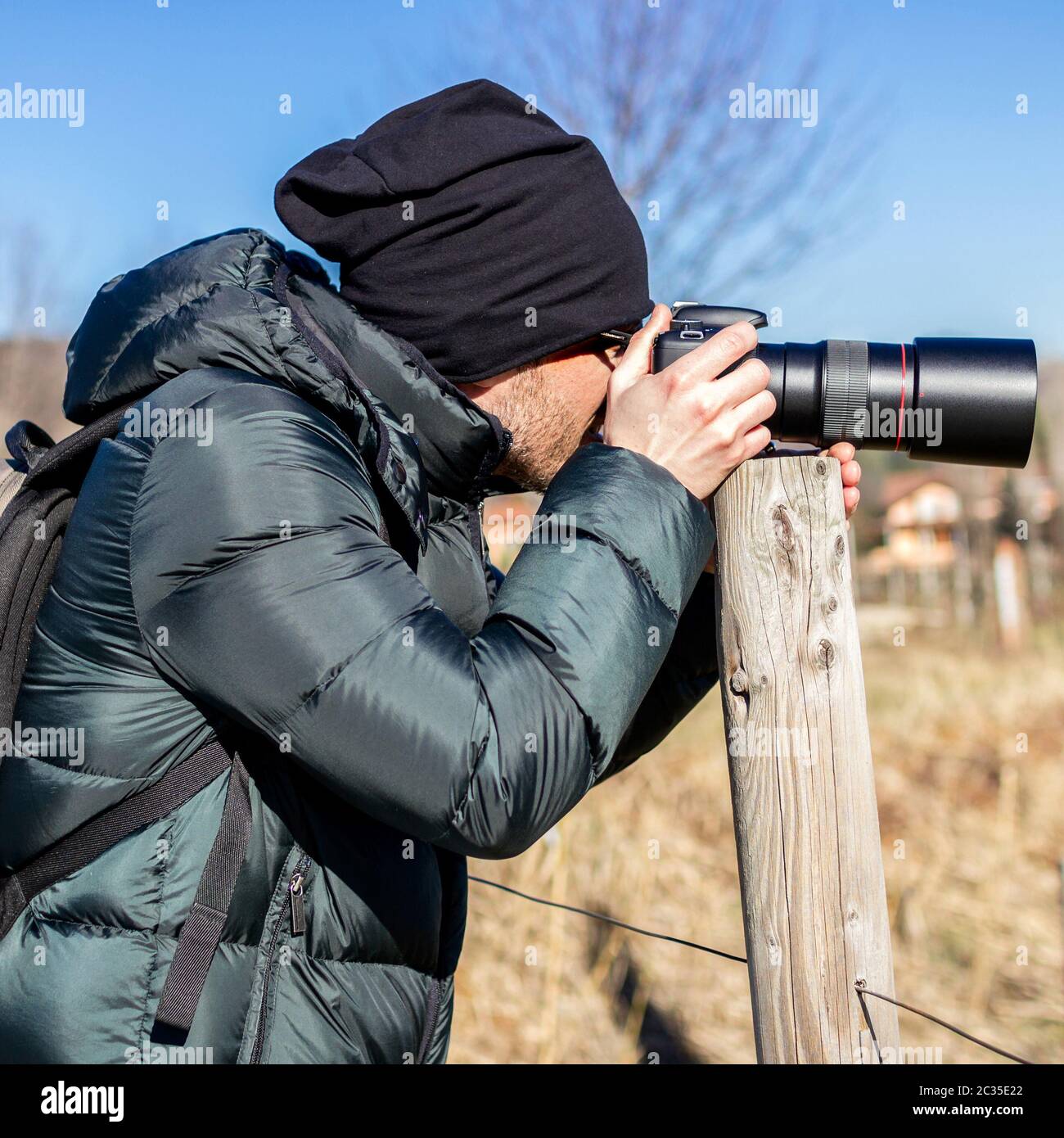 Young photographer in action hi-res stock photography and images - Alamy