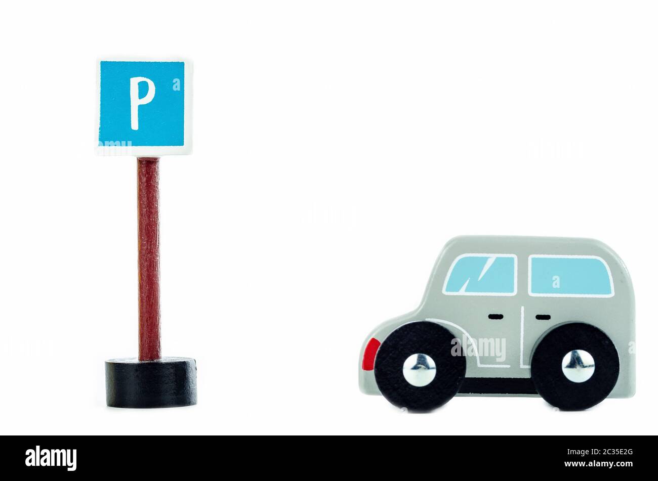 traffic sign parking and blue toy caron white background Stock Photo ...