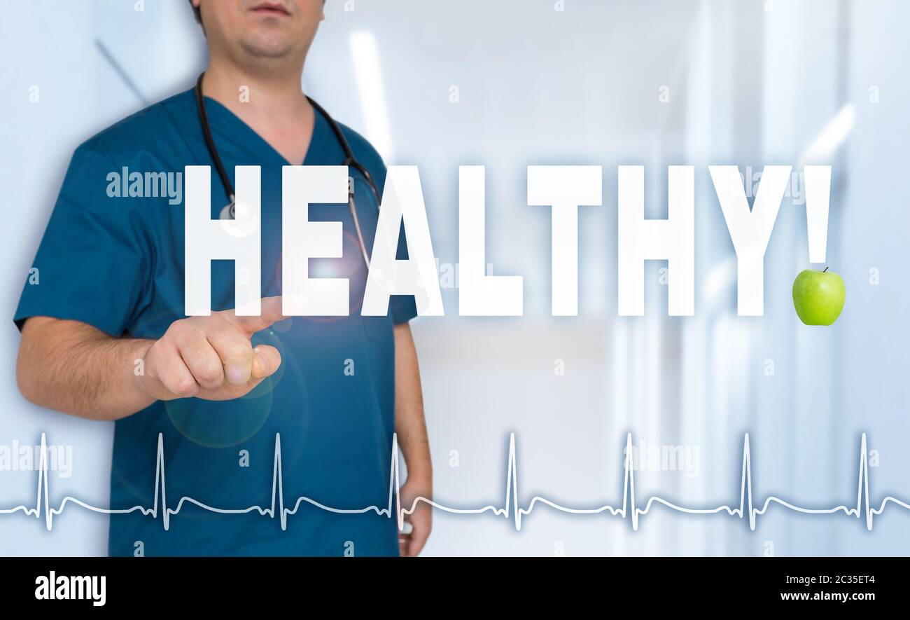 Healthy doctor shows on viewer with heart rate concept Stock Photo - Alamy