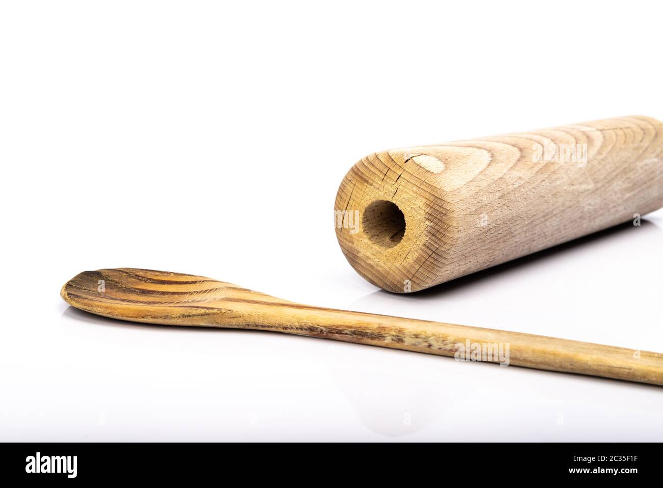 wooden spoon and rolling pin on white background in studio Stock Photo ...