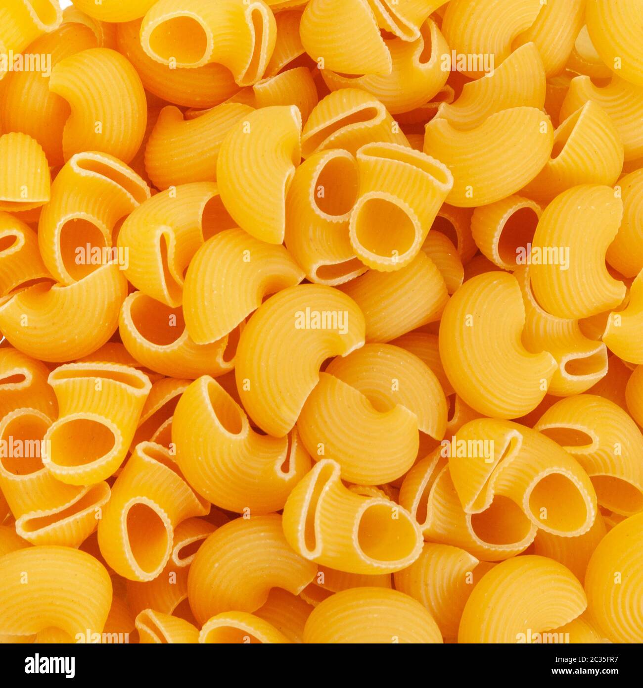 Pasta Pipe Rigate isolated on white background. Top view Stock Photo ...