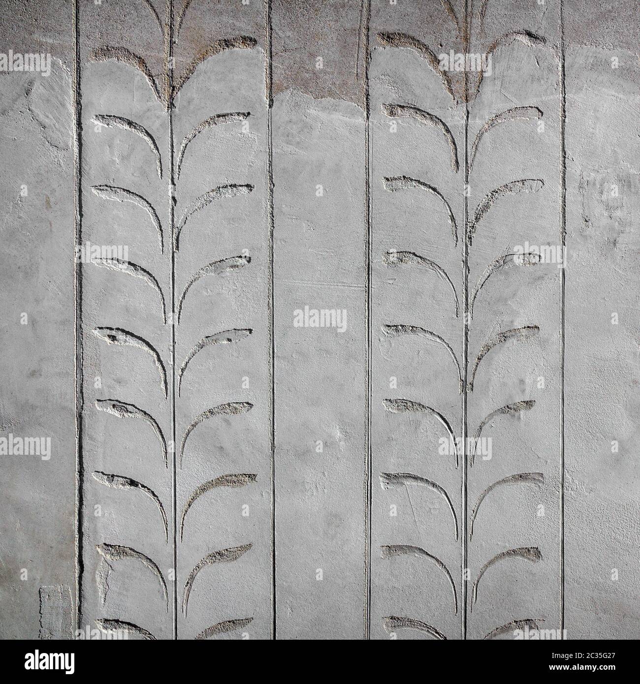 Concrete wall with floral carving Stock Photo - Alamy