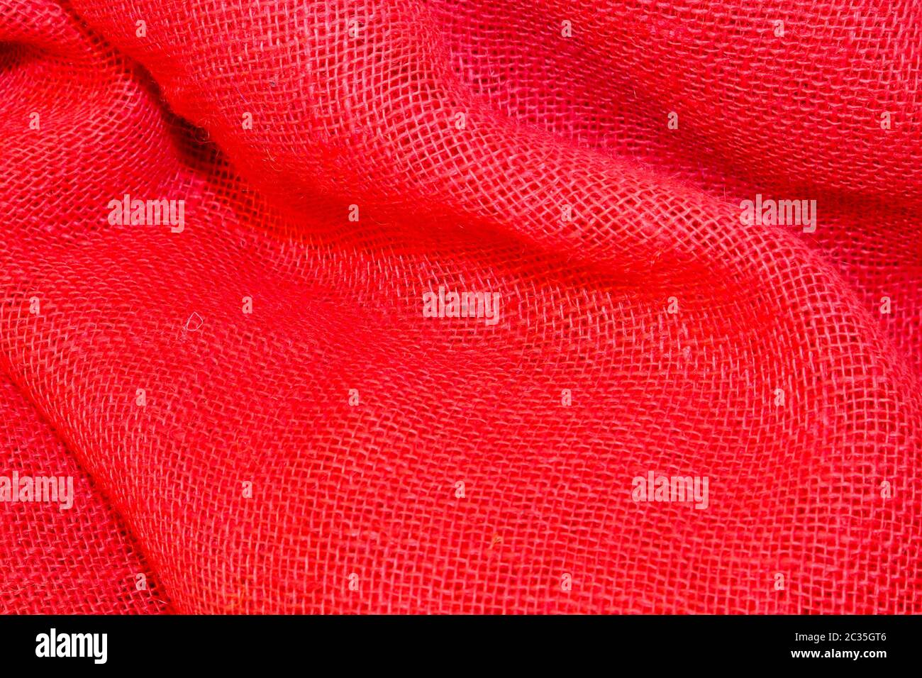 Close up shot of wrinkled red cloth Stock Photo - Alamy