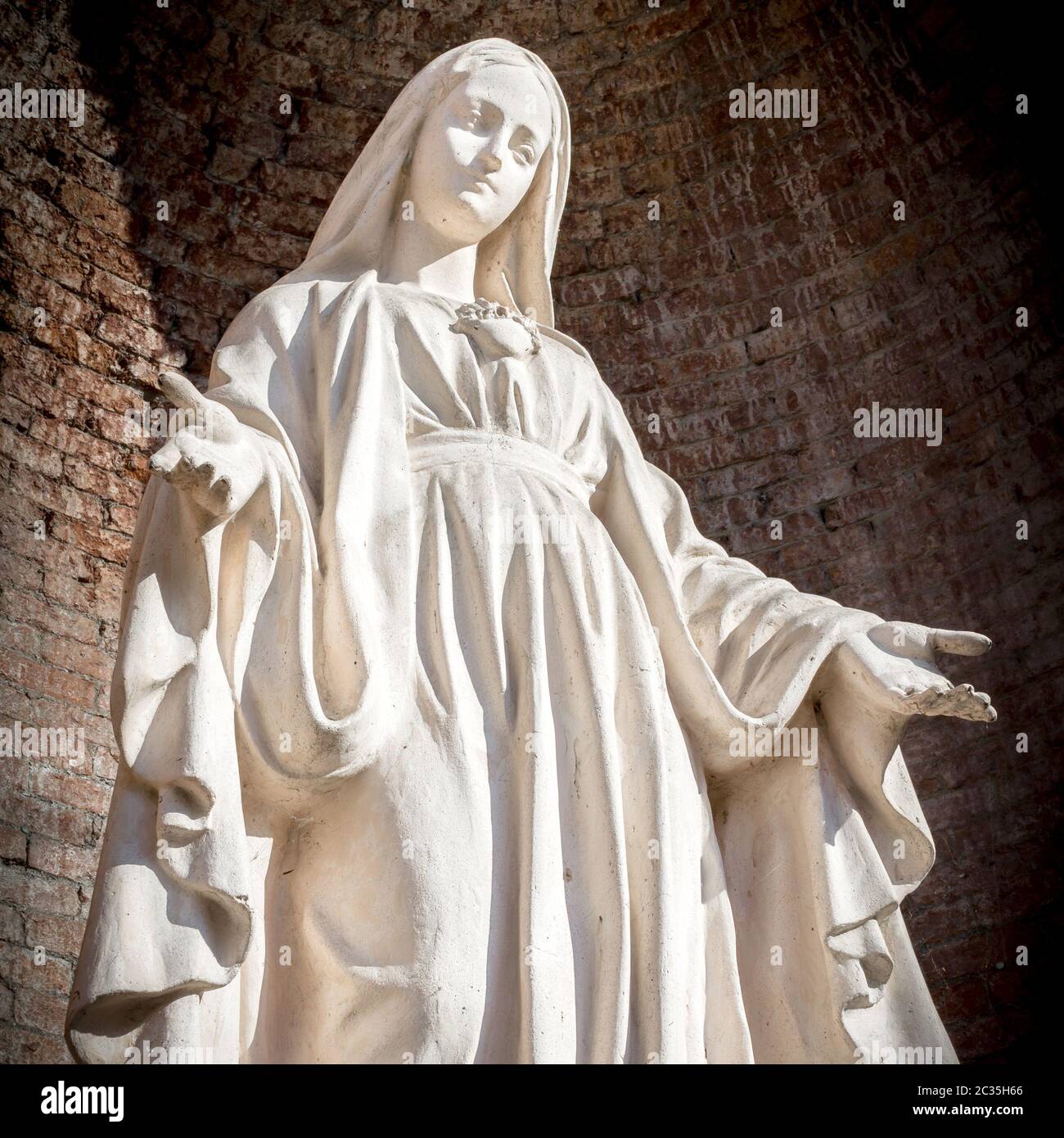 White stone statue of saint Mary Stock Photo - Alamy