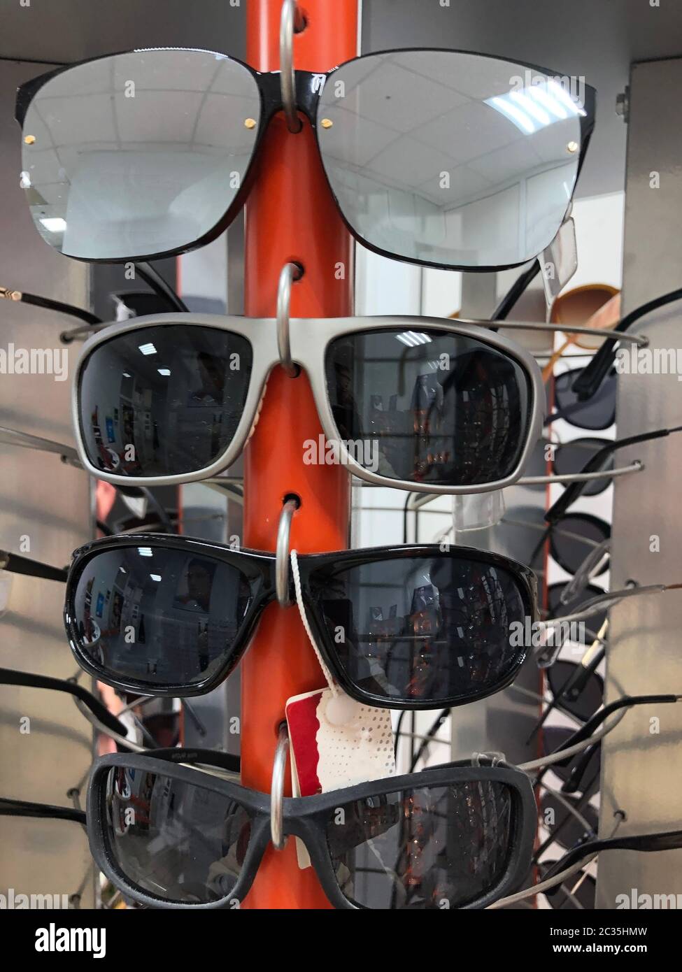 sunglasses on a shop window, contemporary and trendy Stock Photo - Alamy