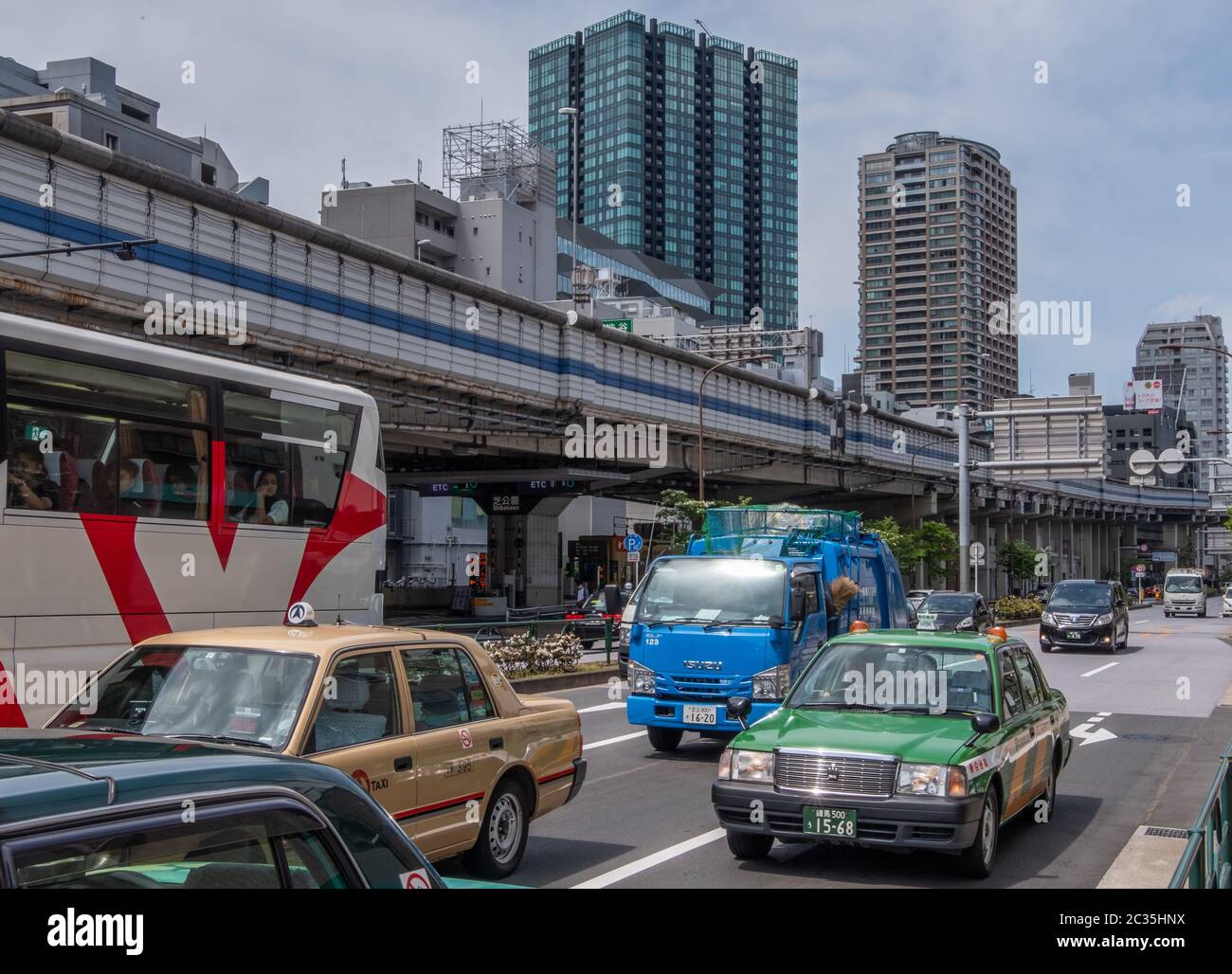 Vehicles in Tokyo street, Japan during the day Stock Photo - Alamy