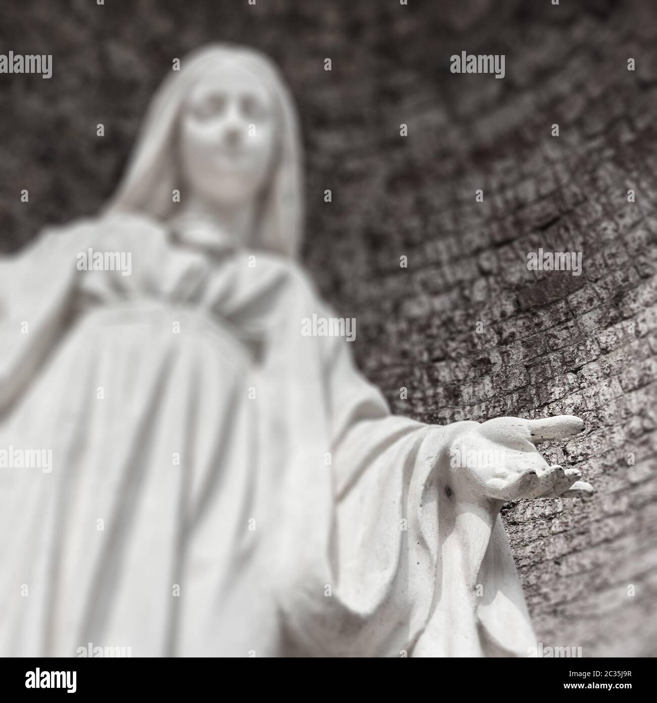 Hand of Virgin Mary statue Stock Photo - Alamy