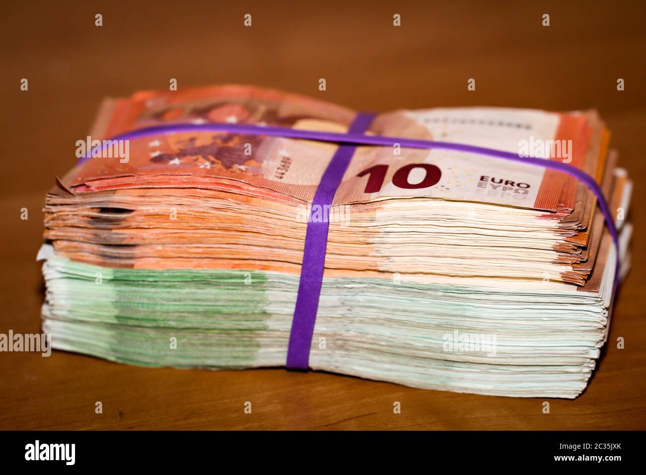 several thousand euros in banknotes, banknotes bundled on a stack Stock ...