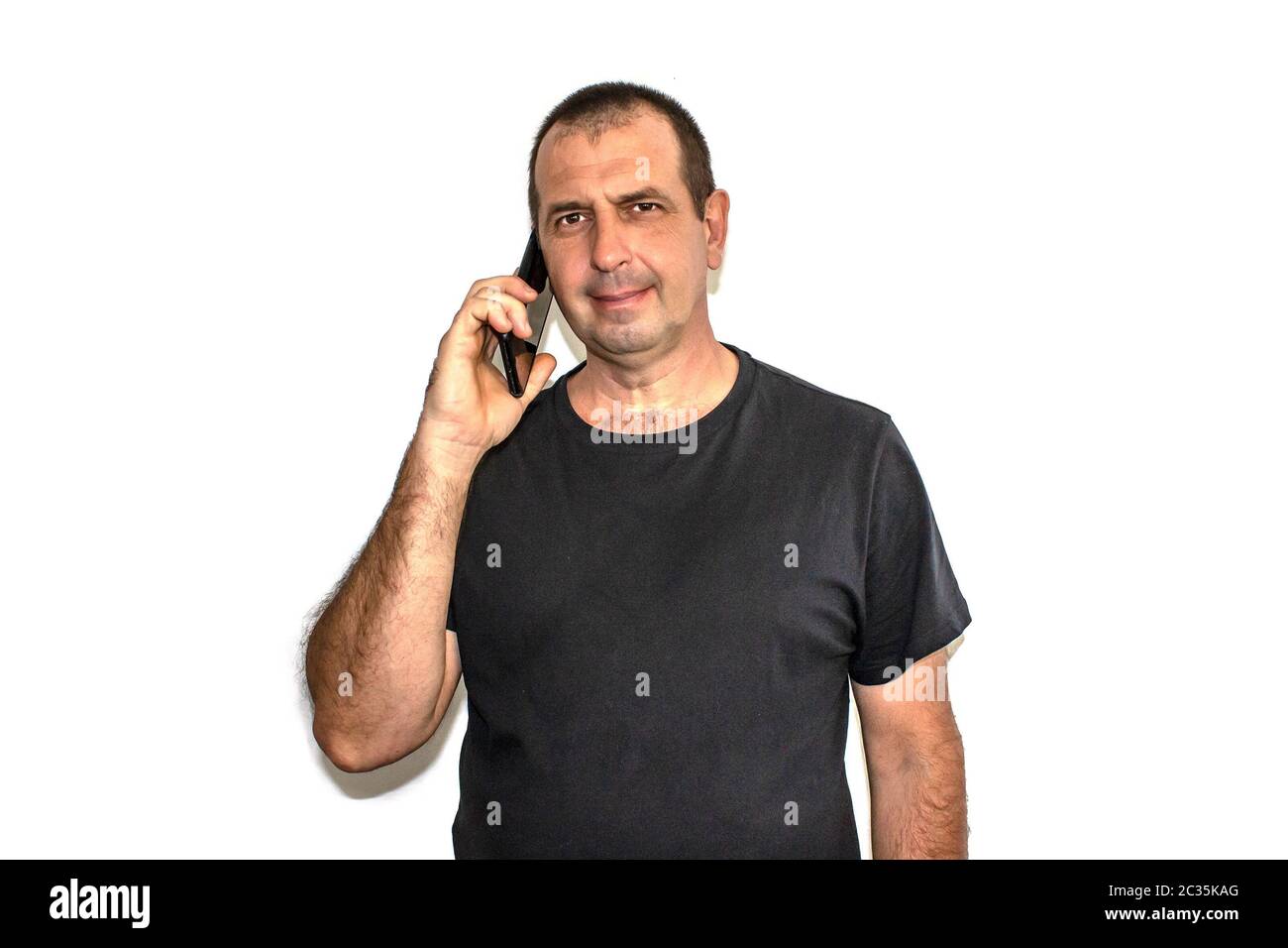 man talking on the phone isolated on white background Stock Photo - Alamy
