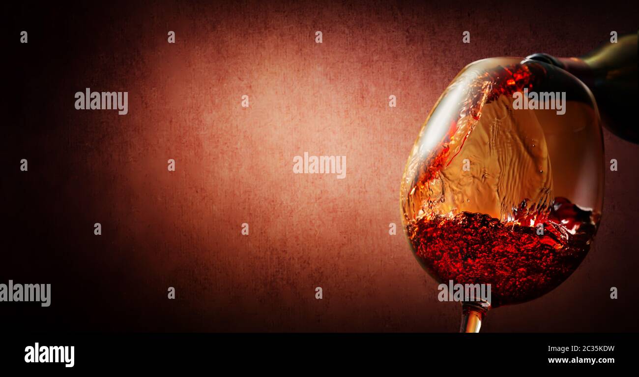 Wine on textured background Stock Photo - Alamy