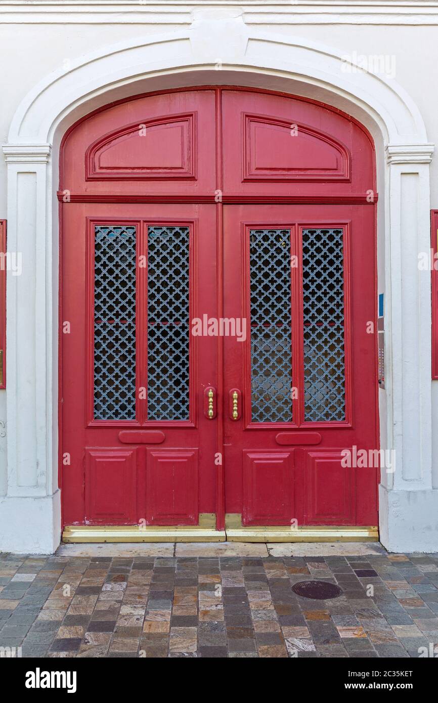 Big Double Red Door in Cannes France Stock Photo - Alamy