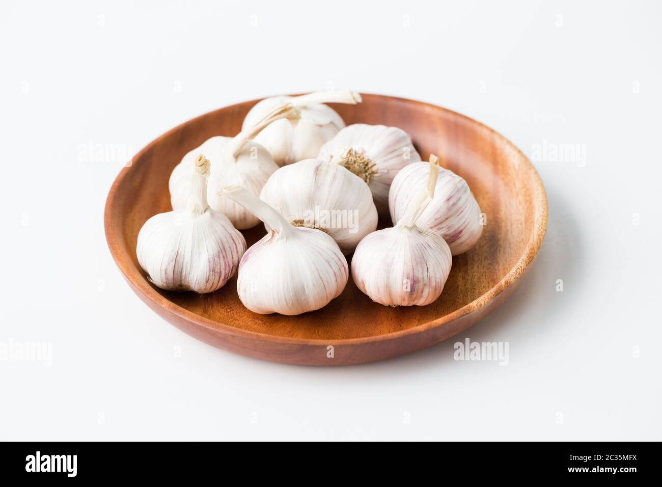 Fresh garlic bulb-garlic clover on the white background Stock Photo - Alamy