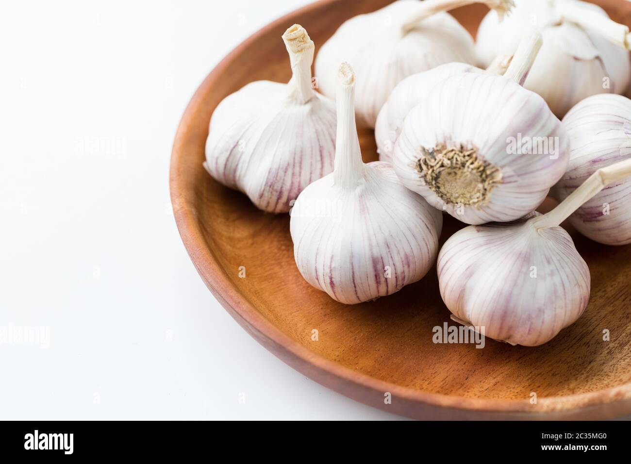 Fresh garlic bulb-garlic clover on the white background Stock Photo - Alamy