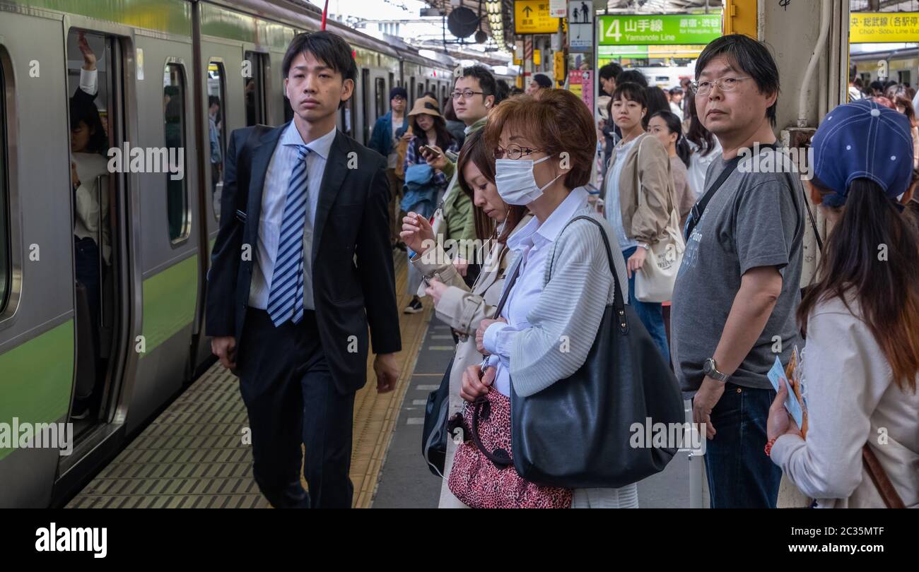 Commuters at Shinjuku Railway Station, Tokyo, Japan Stock Photo - Alamy