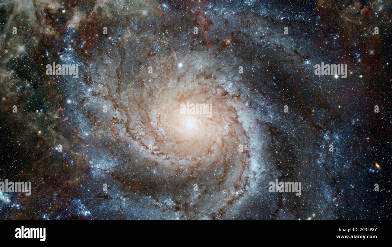 Giant spiral disk of stars, dust and gas. Elements of this image ...