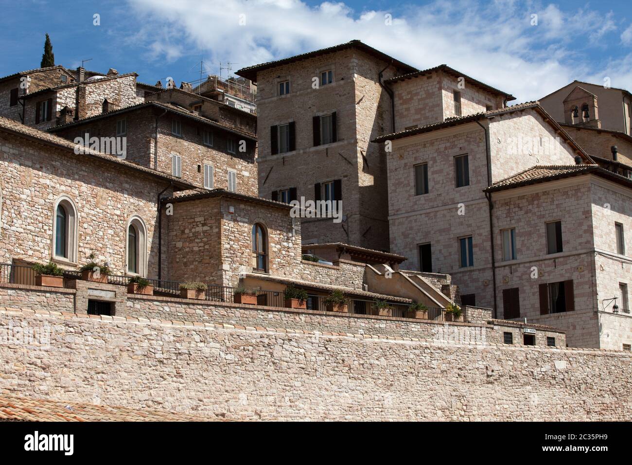 Medieval street in the Italian hill town of Assisi Stock Photo - Alamy