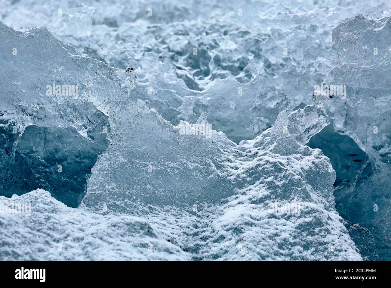 Ice blocks melting off an iceberg, icy shapes forming Stock Photo - Alamy