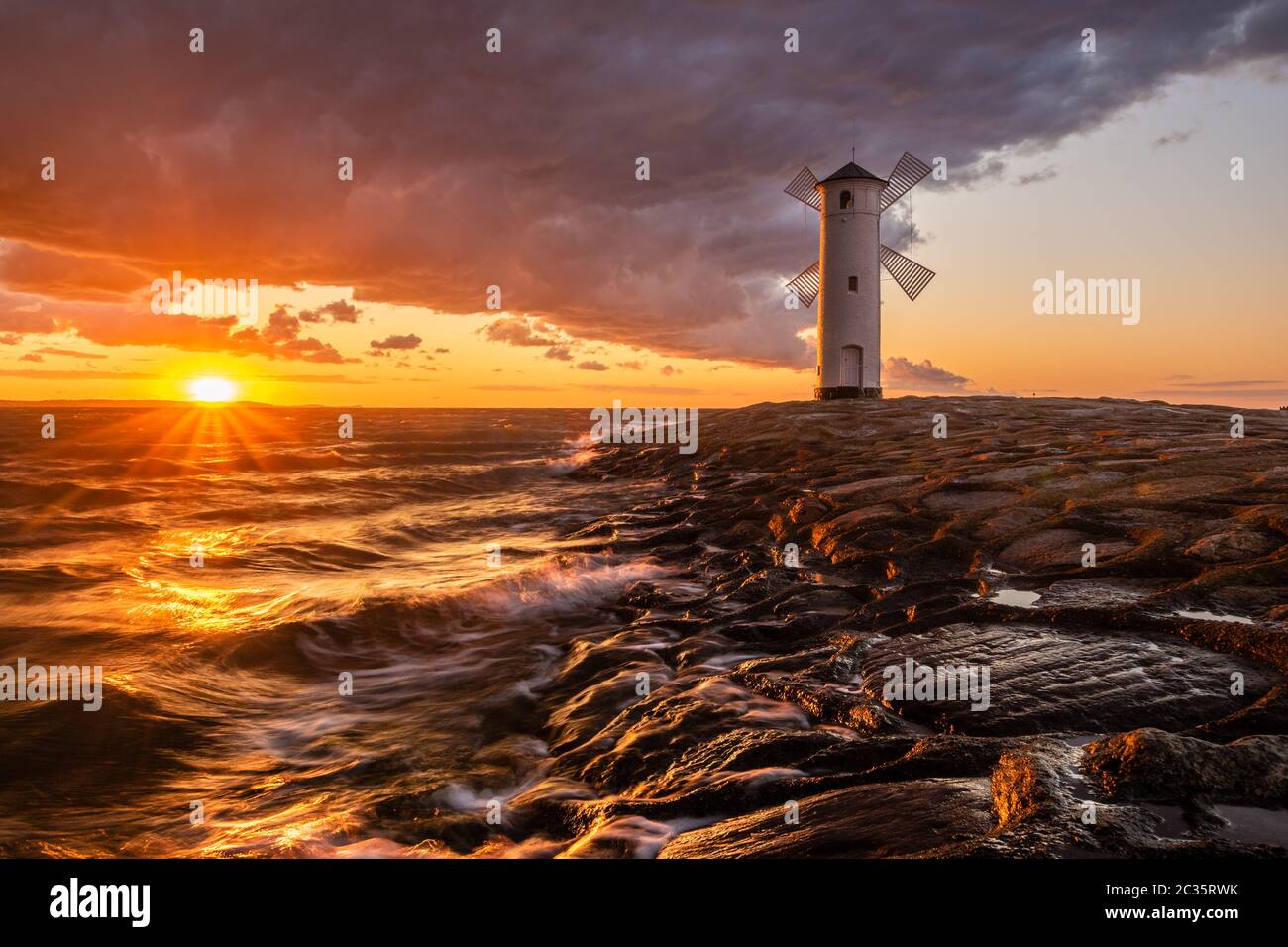lighthouse in the shape of a windmill in Swinoujscie in Poland during ...