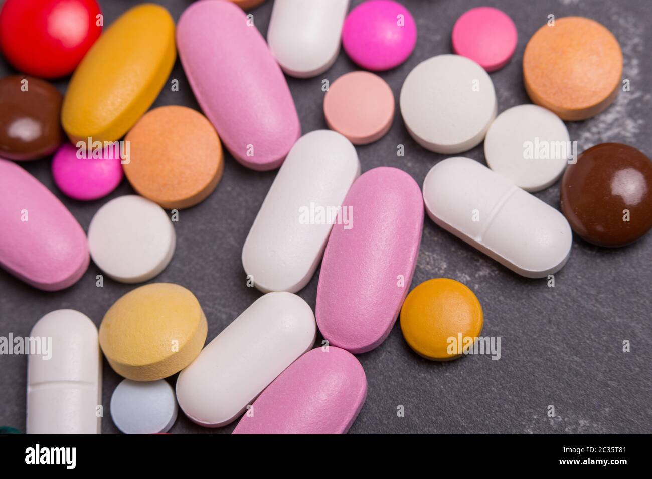 different tablets pills capsule heap mix therapy drugs Stock Photo - Alamy